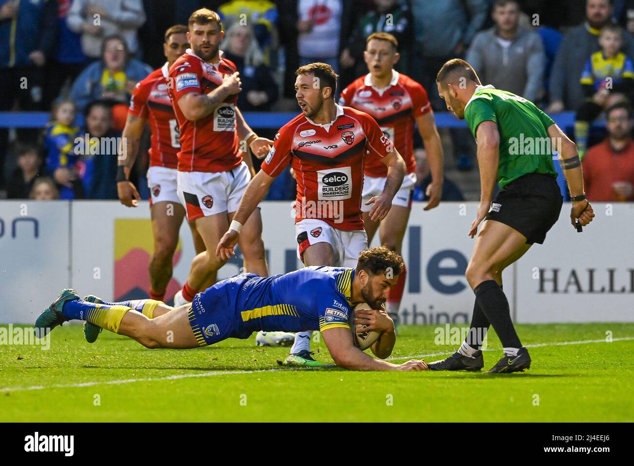Toby King #4 of Warrington Wolves goes over for a try in, on 4/14/2022 ...