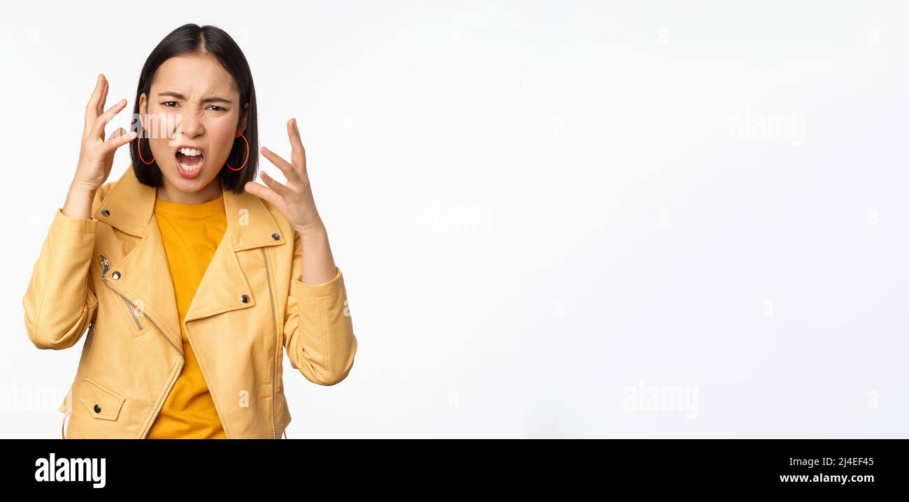 Asian angry woman arguing, shaking hands angry and screaming, shouting ...
