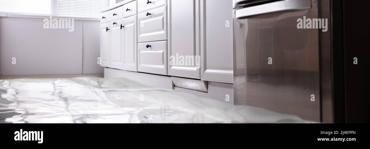 Close-up Of Flooded Floor In Kitchen From Water Leak Stock Photo - Alamy