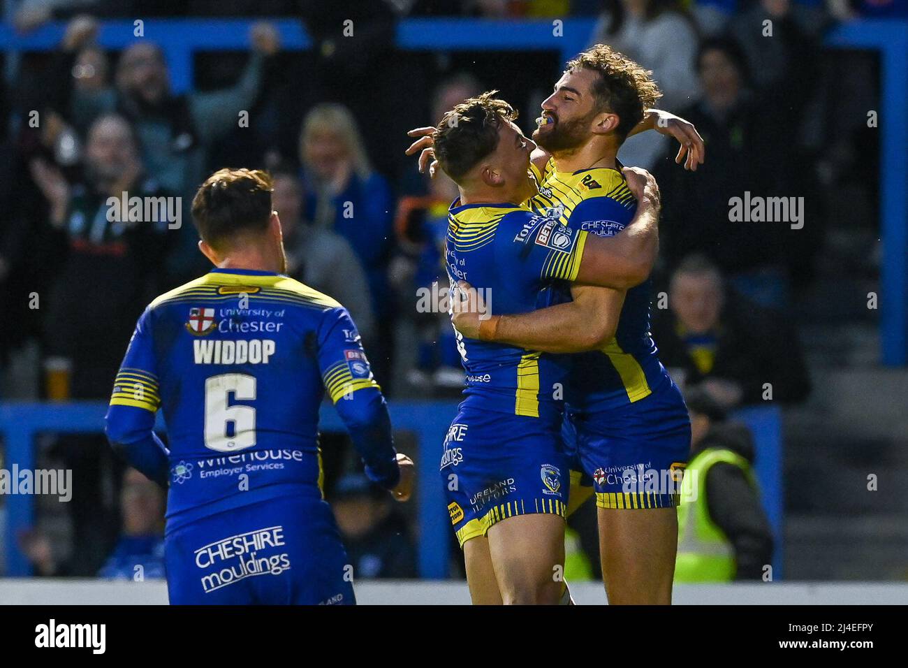 Toby King #4 of Warrington Wolves celebrates his try in, on 4/14/2022 ...