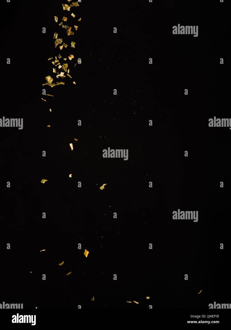 Oriental spices, condiments in frozen flight on a black background ...