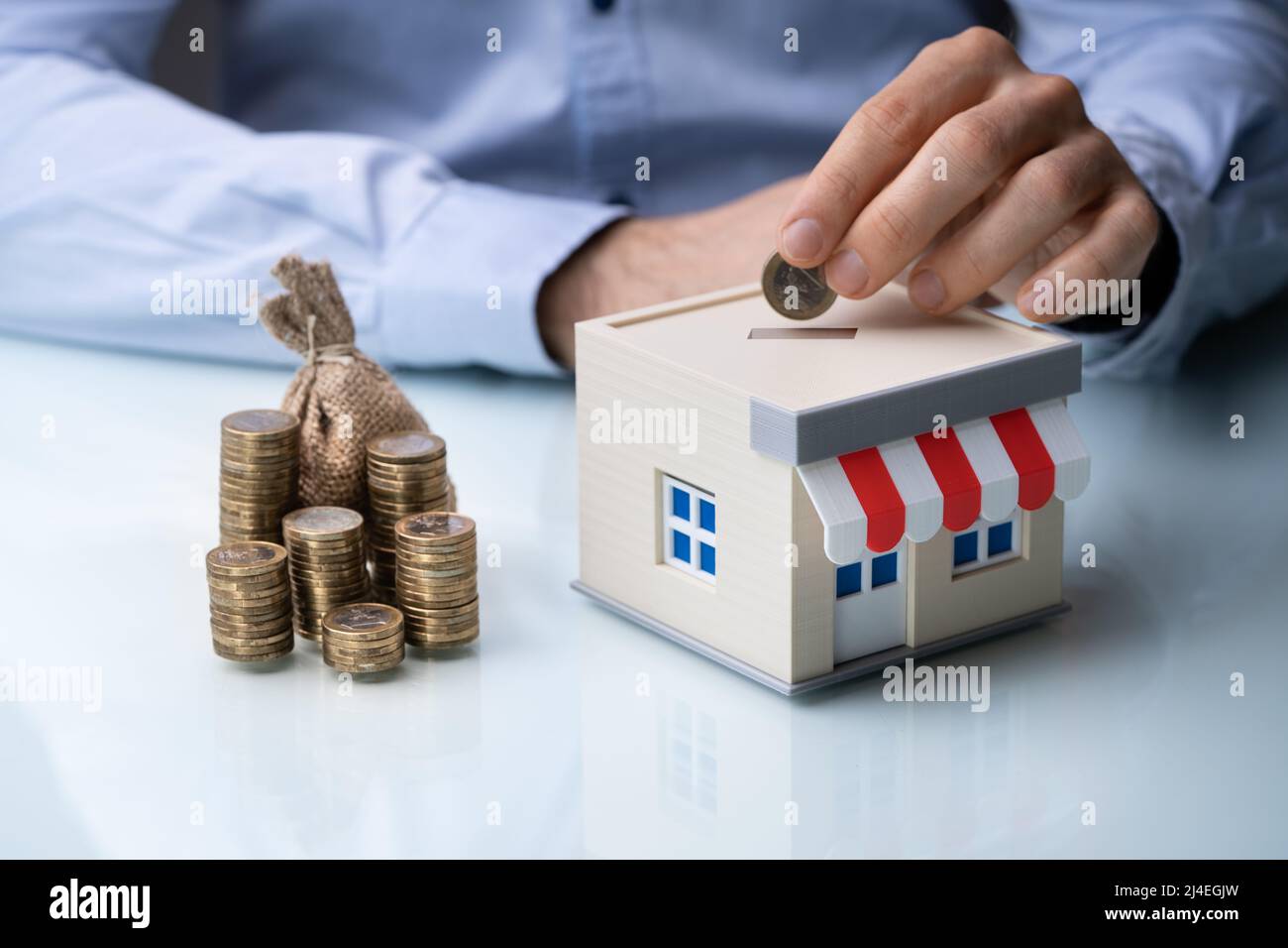 Small money saving hi-res stock photography and images - Alamy