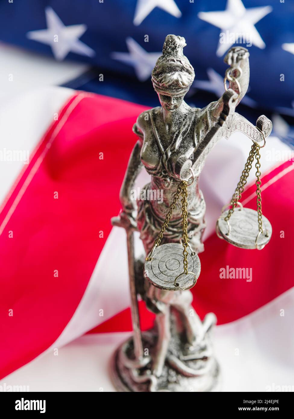 The symbol of justice is a figurine of Themis against the background of ...