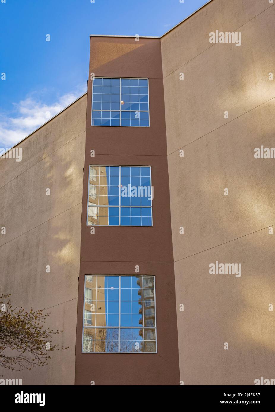 Facade detail of a modern high-rise apartment building. Abstract ...
