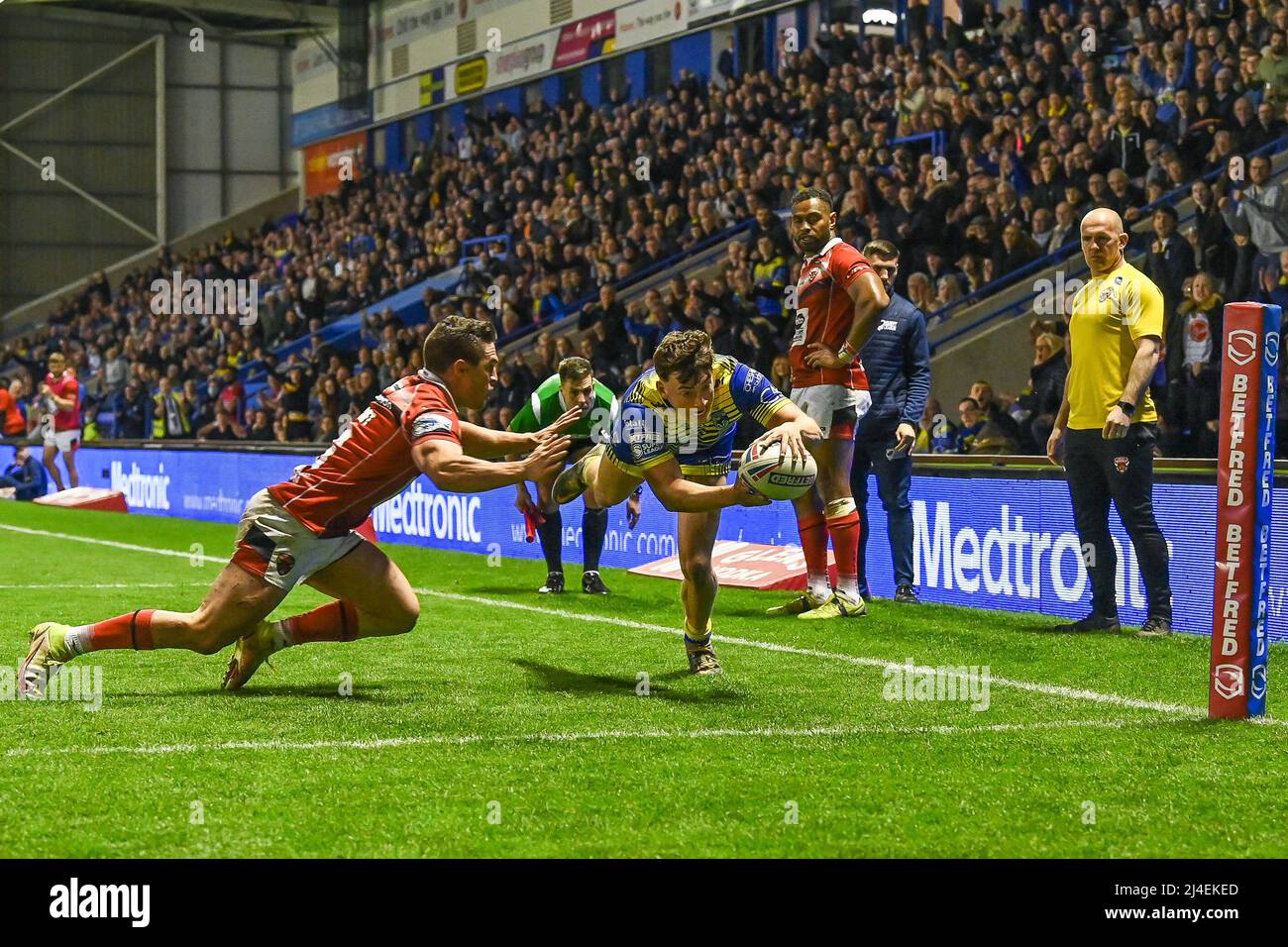 Matty Ashton #5 of Warrington Wolves goes over for a try Stock Photo ...