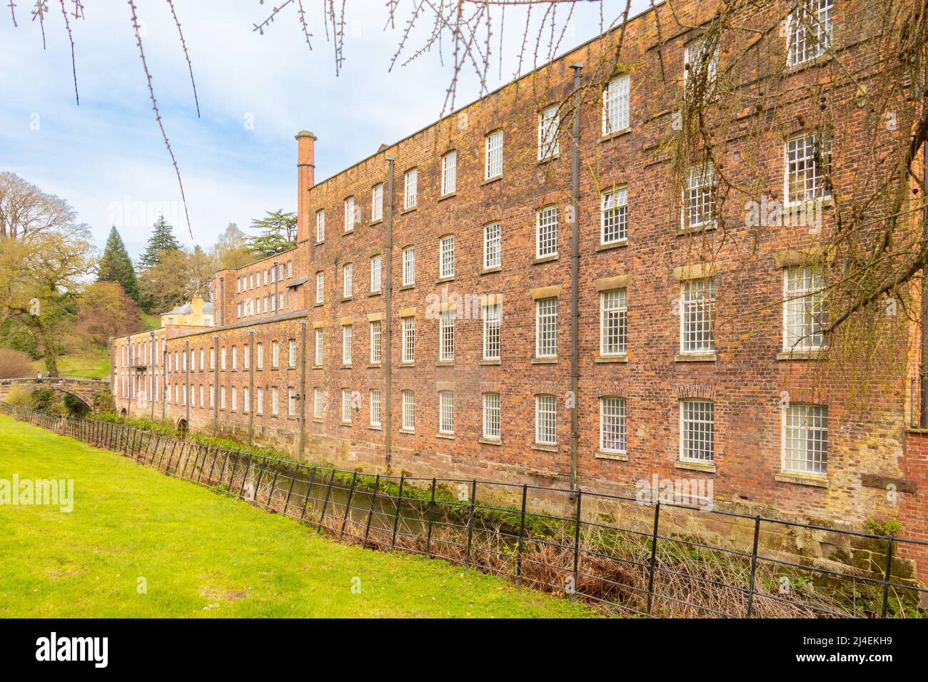 Dunham Massey red brick textile mill building and chimney Stock Photo ...