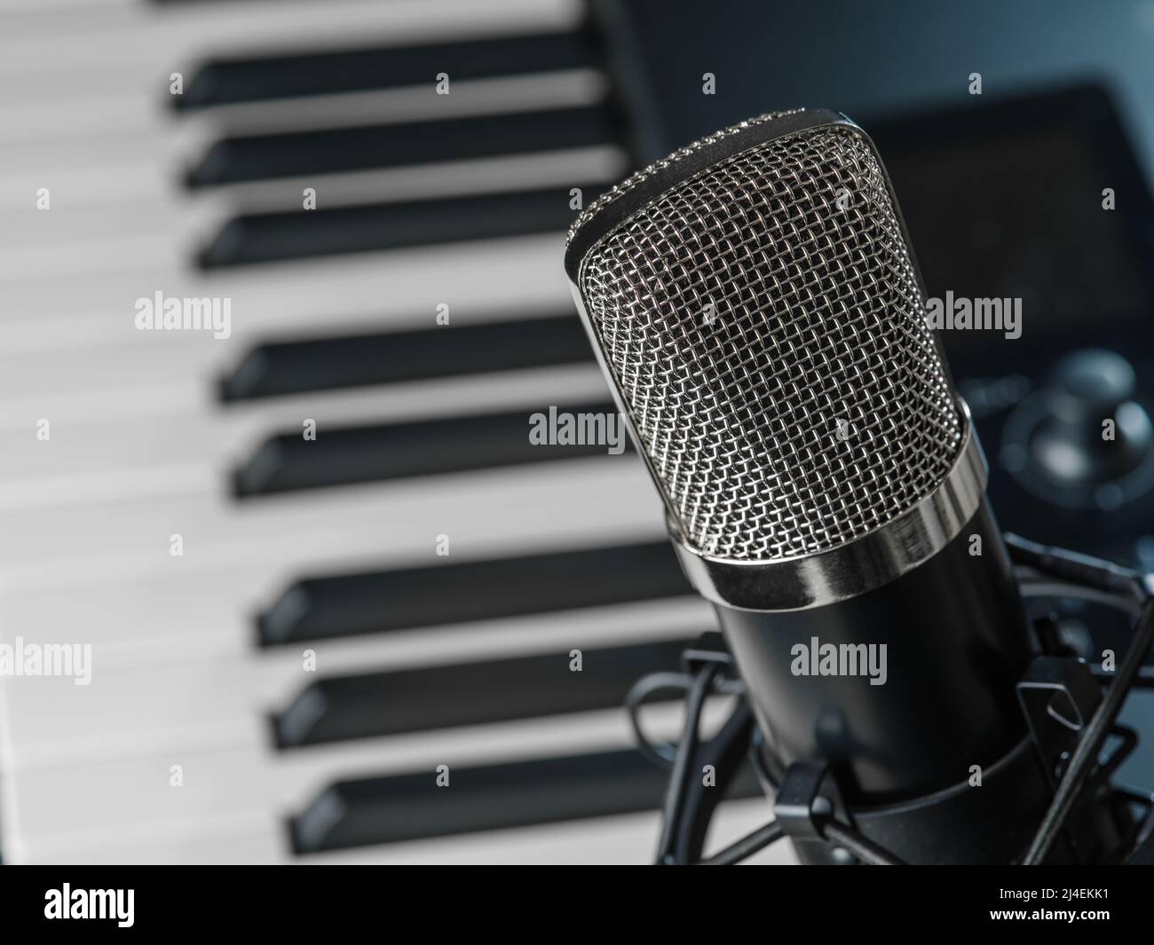 Microphone and midi keyboard, synthesizer. Close-up. Music, vocals ...