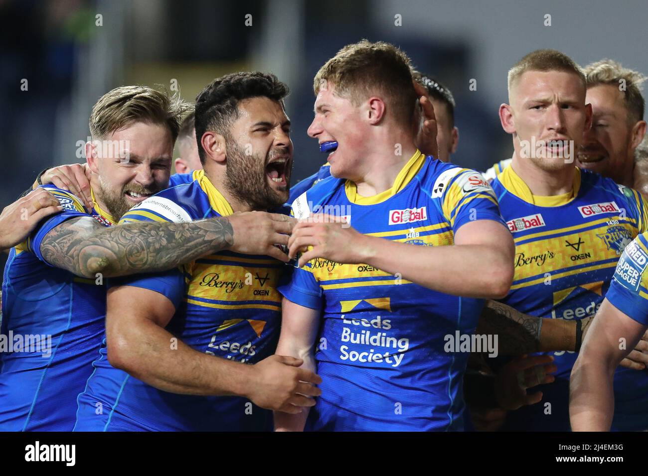 Morgan Gannon (21) of Leeds Rhinos celebrates his try with his team ...