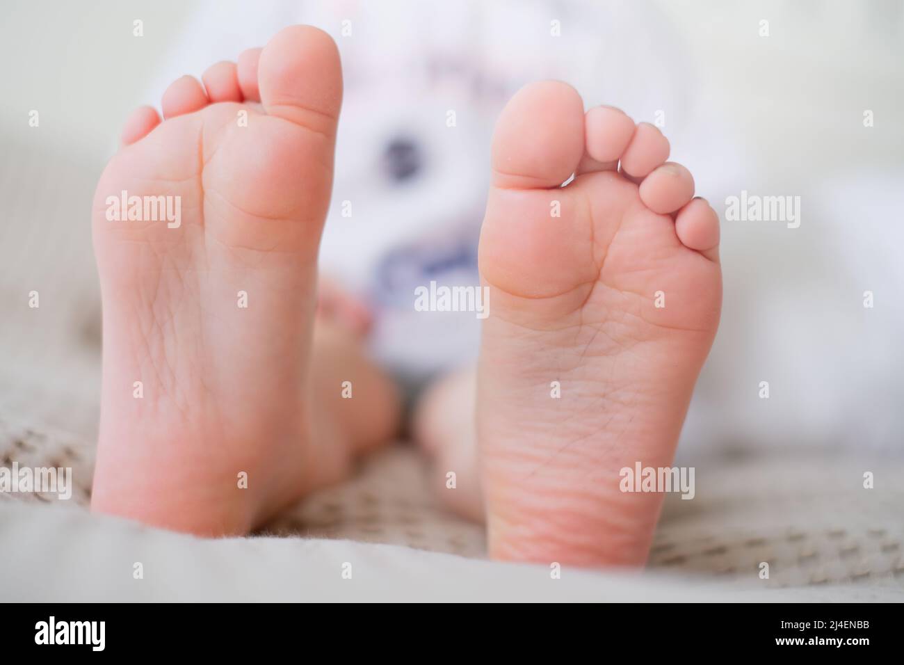 Cute childrens feet hi-res stock photography and images - Alamy