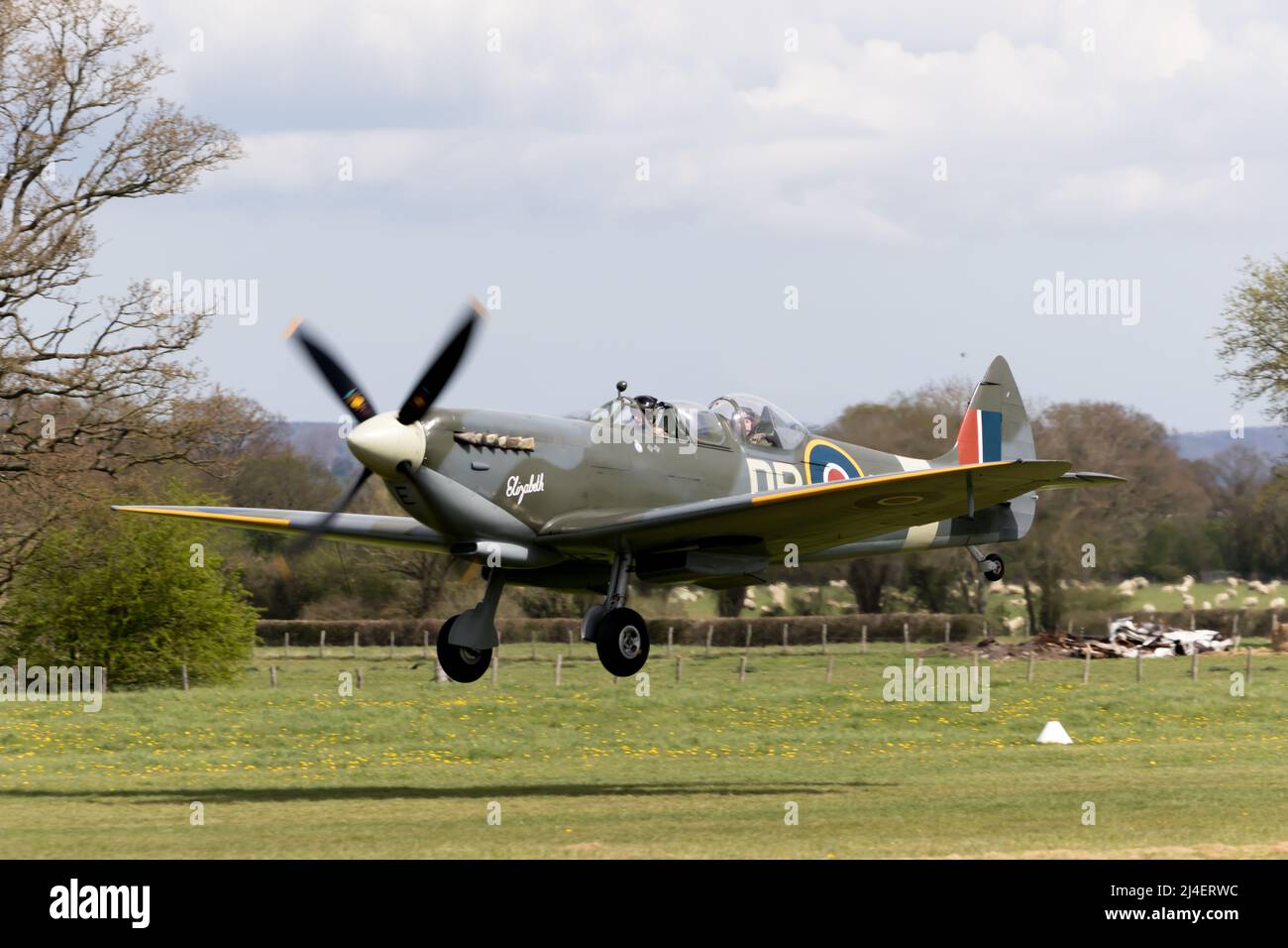Spitfire taking off and landing at Kent airfield Stock Photo - Alamy