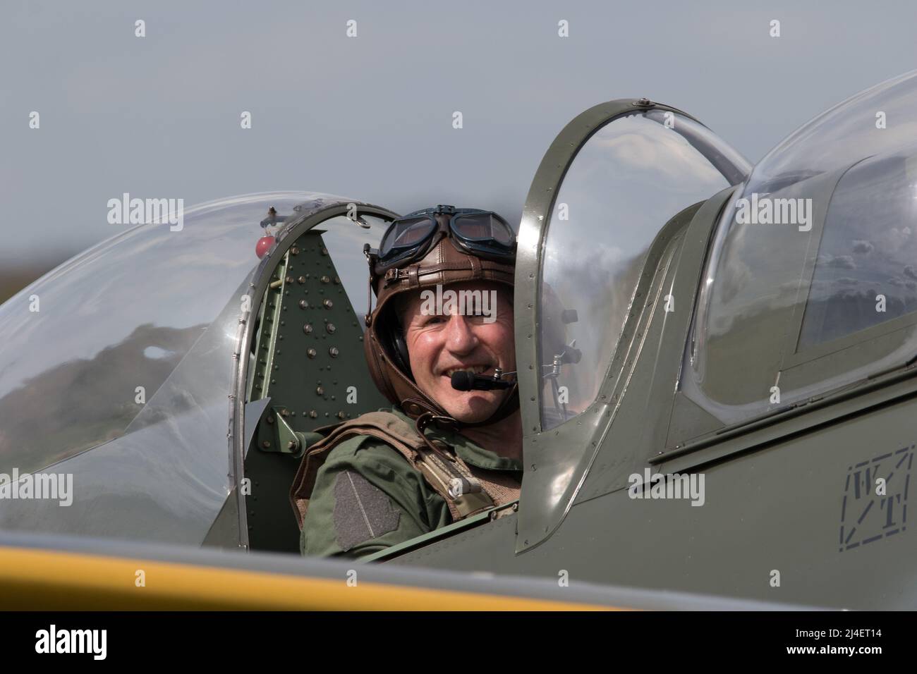 Spitfire taking off and landing at Kent airfield Stock Photo - Alamy