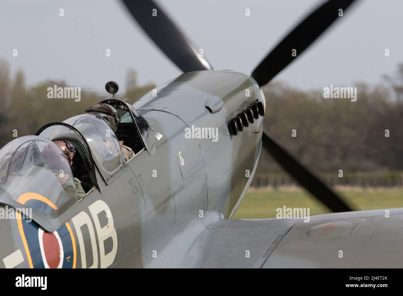 Spitfire taking off and landing at Kent airfield Stock Photo - Alamy