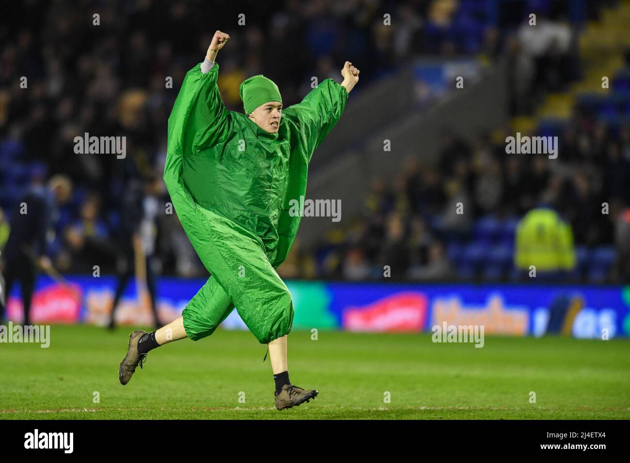 A fan participates in the half time entertainment at the Halliwell ...