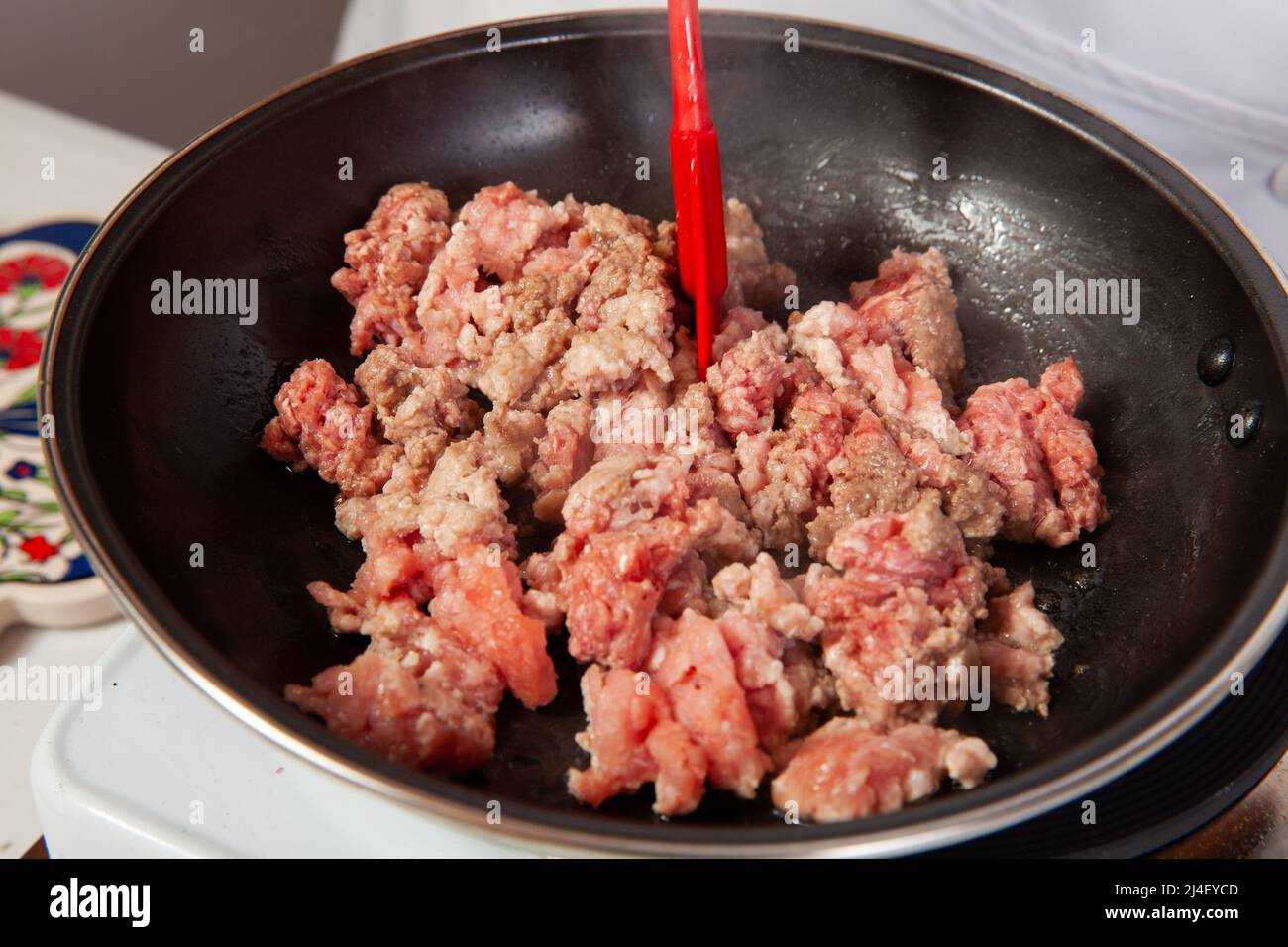 Preparation of ground beef with the traditional Colombian hogao or ...