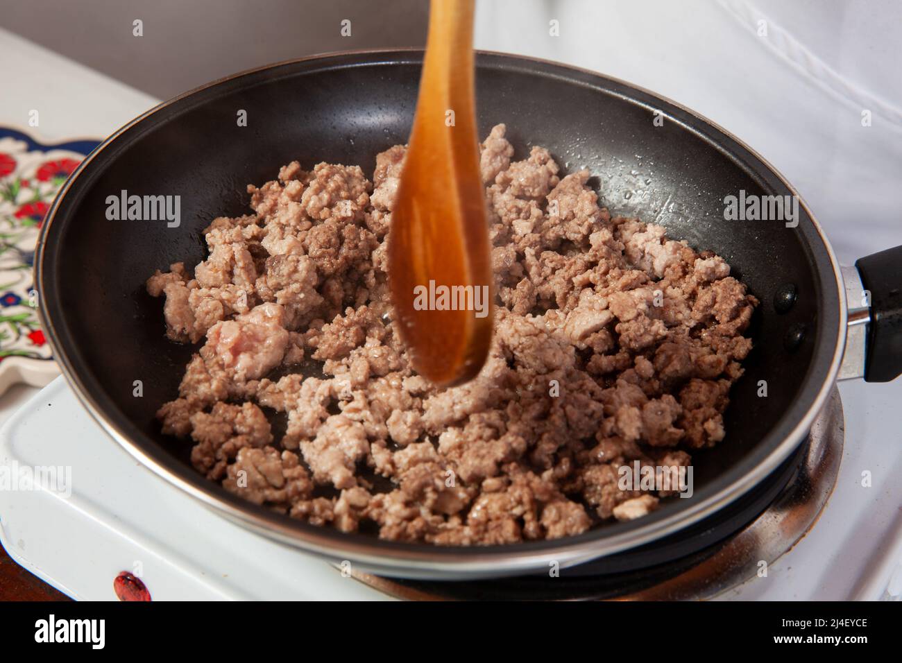 Preparation of ground beef with the traditional Colombian hogao or ...
