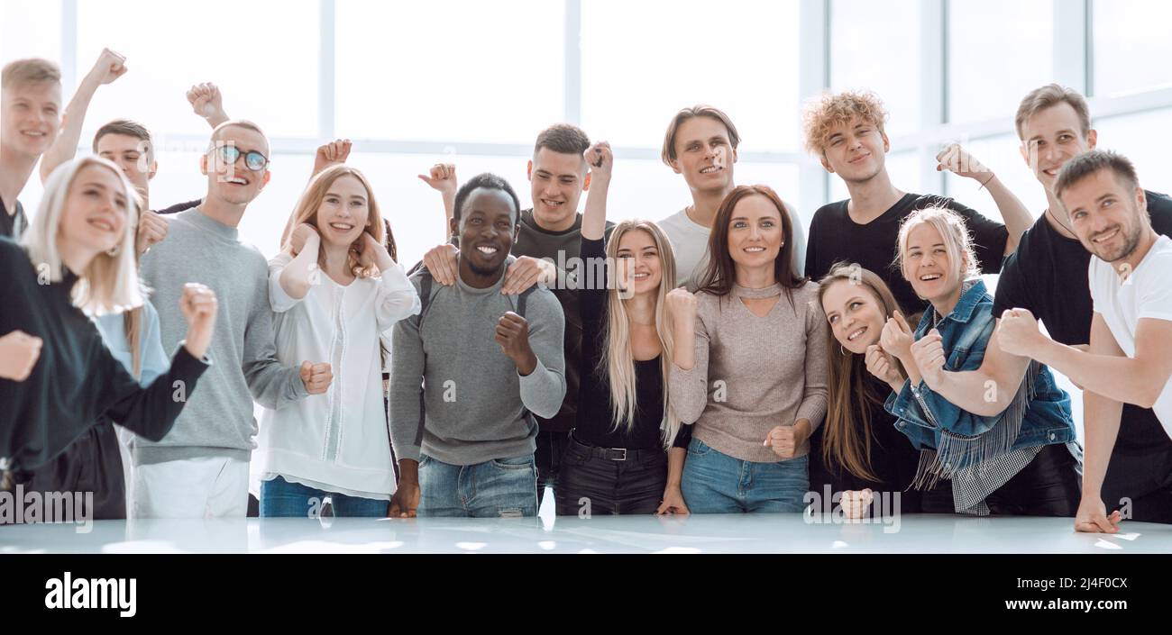 large group of happy young people standing together Stock Photo - Alamy