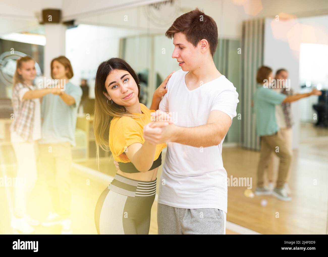 Teens dancing waltz in studio Stock Photo - Alamy