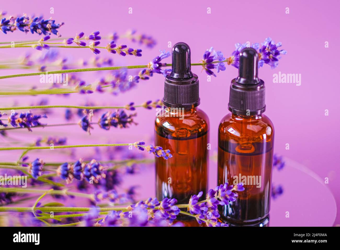 Lavender essential oil.Aromatherapy and massage. glass bottles oil set ...