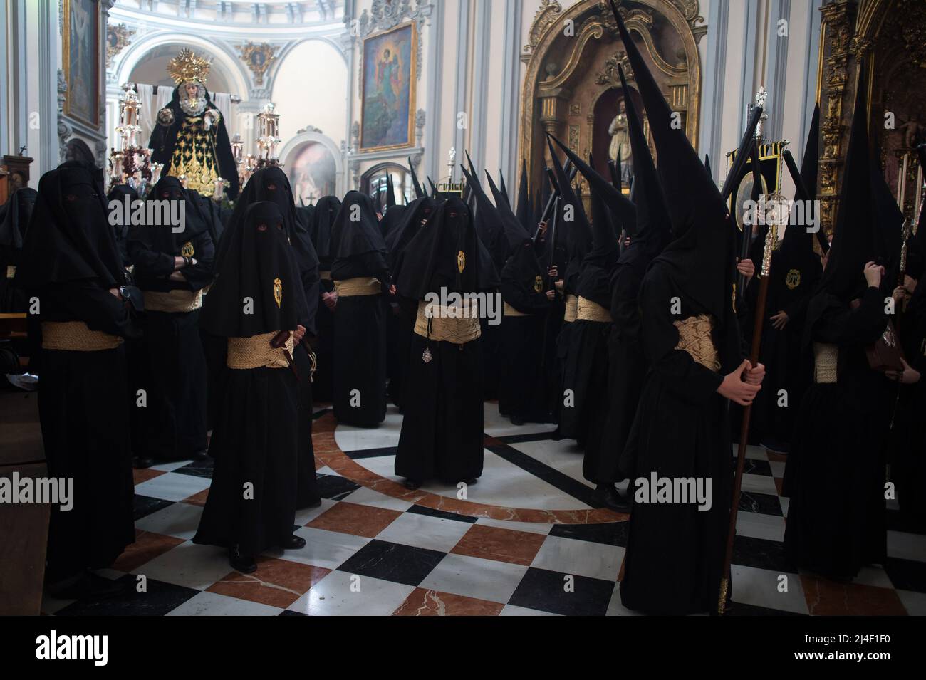 Black hoods hi-res stock photography and images - Alamy