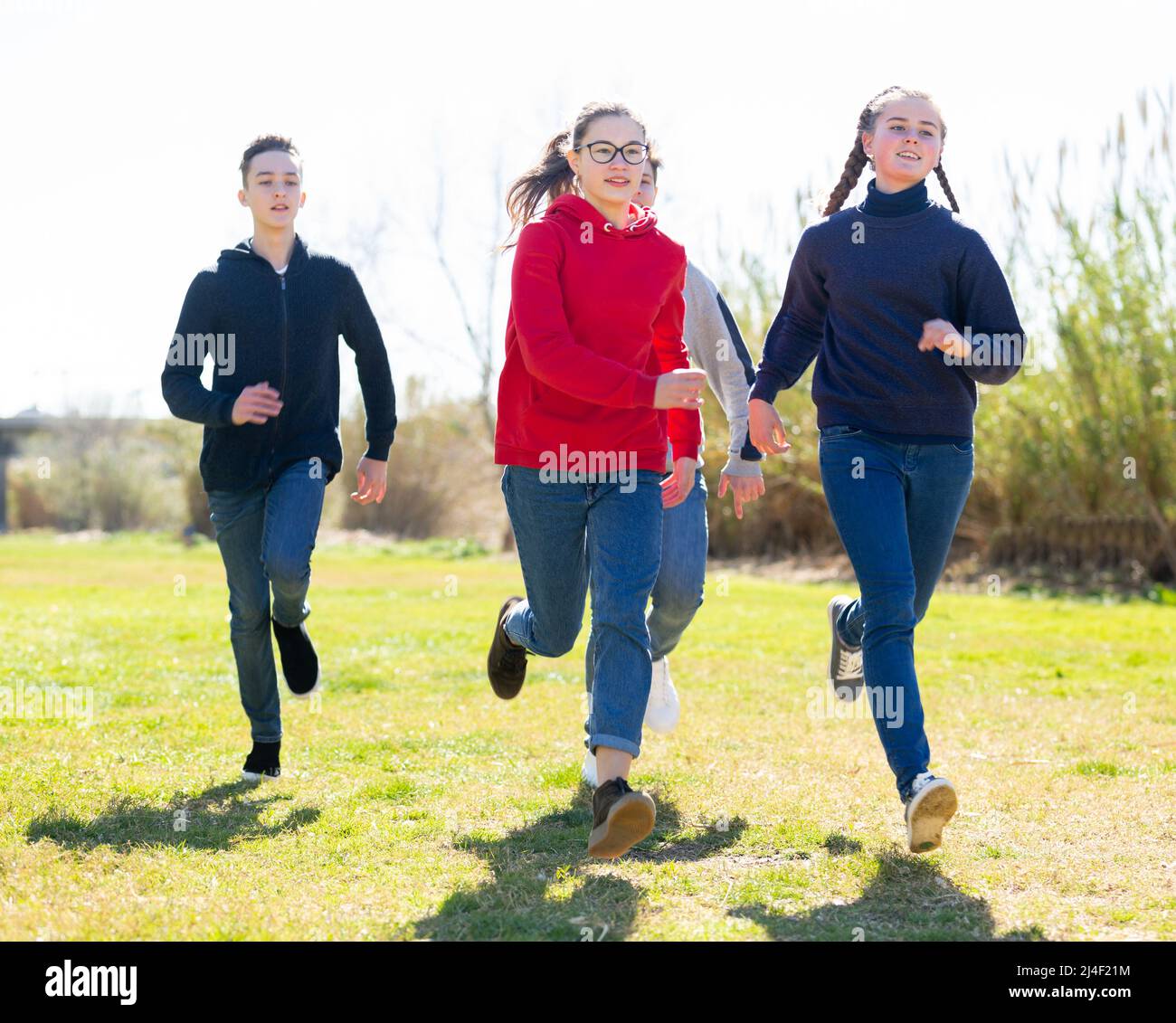Boy chasing girl hi-res stock photography and images - Alamy