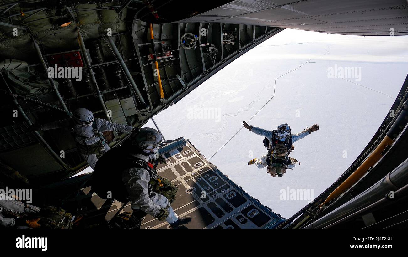 Naval Special Warfare members perform a high-altitude low-opening jump ...