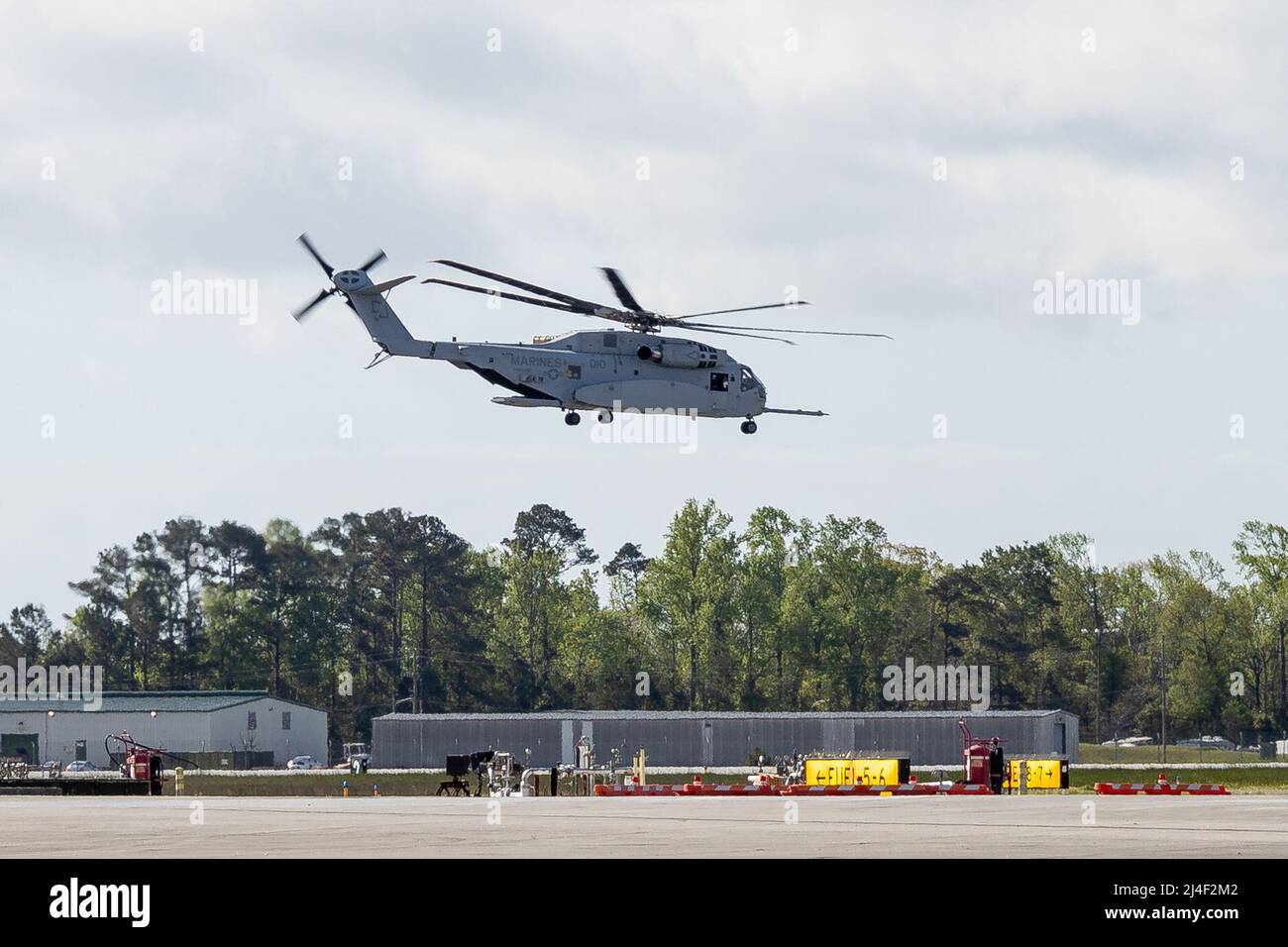 U.S. Marines with Marine Heavy Helicopter Squadron (HMH) 461 take off ...