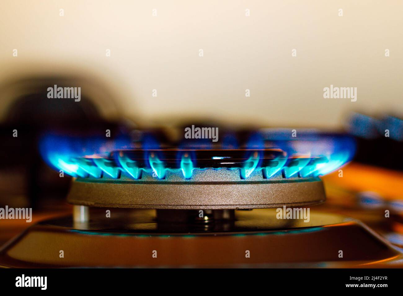 In this photo illustration the blue flame produced by cooking gas ...