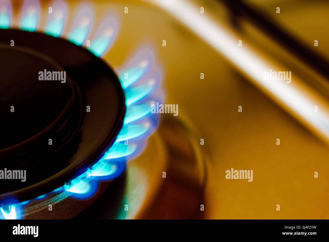 In this photo illustration the blue flame produced by cooking gas ...