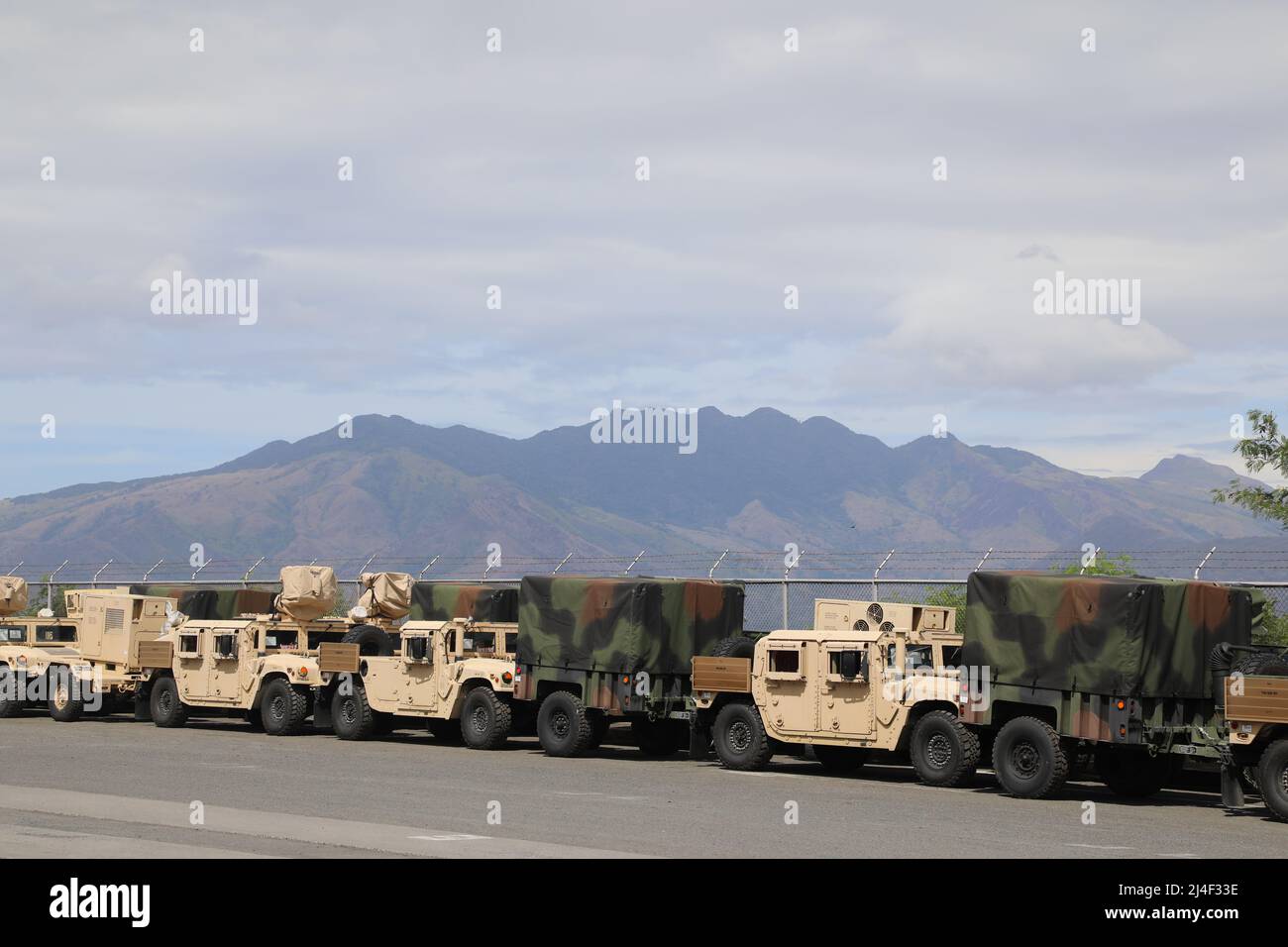 As part of the Army Prepositioned Stock 3, military vehicles are staged ...
