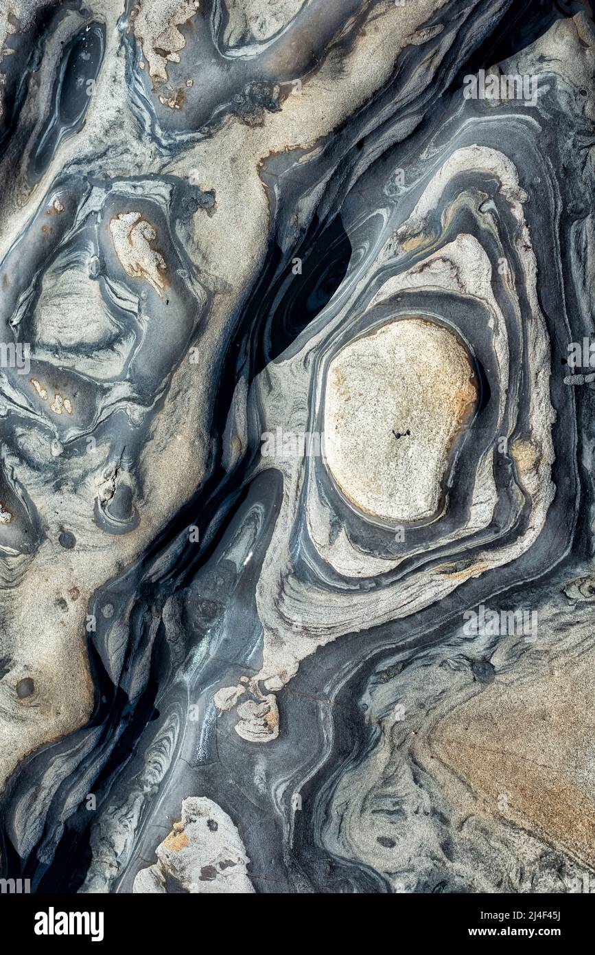 Close-up views of tide pool rocks with unique colors and patterns Stock ...