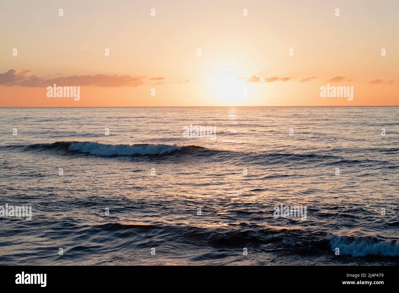 Summer sunset small waves hi-res stock photography and images - Alamy