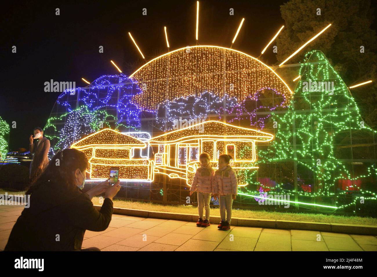 Decorative lights are seen in Pyongyang on April 14, 2022, as part of ...