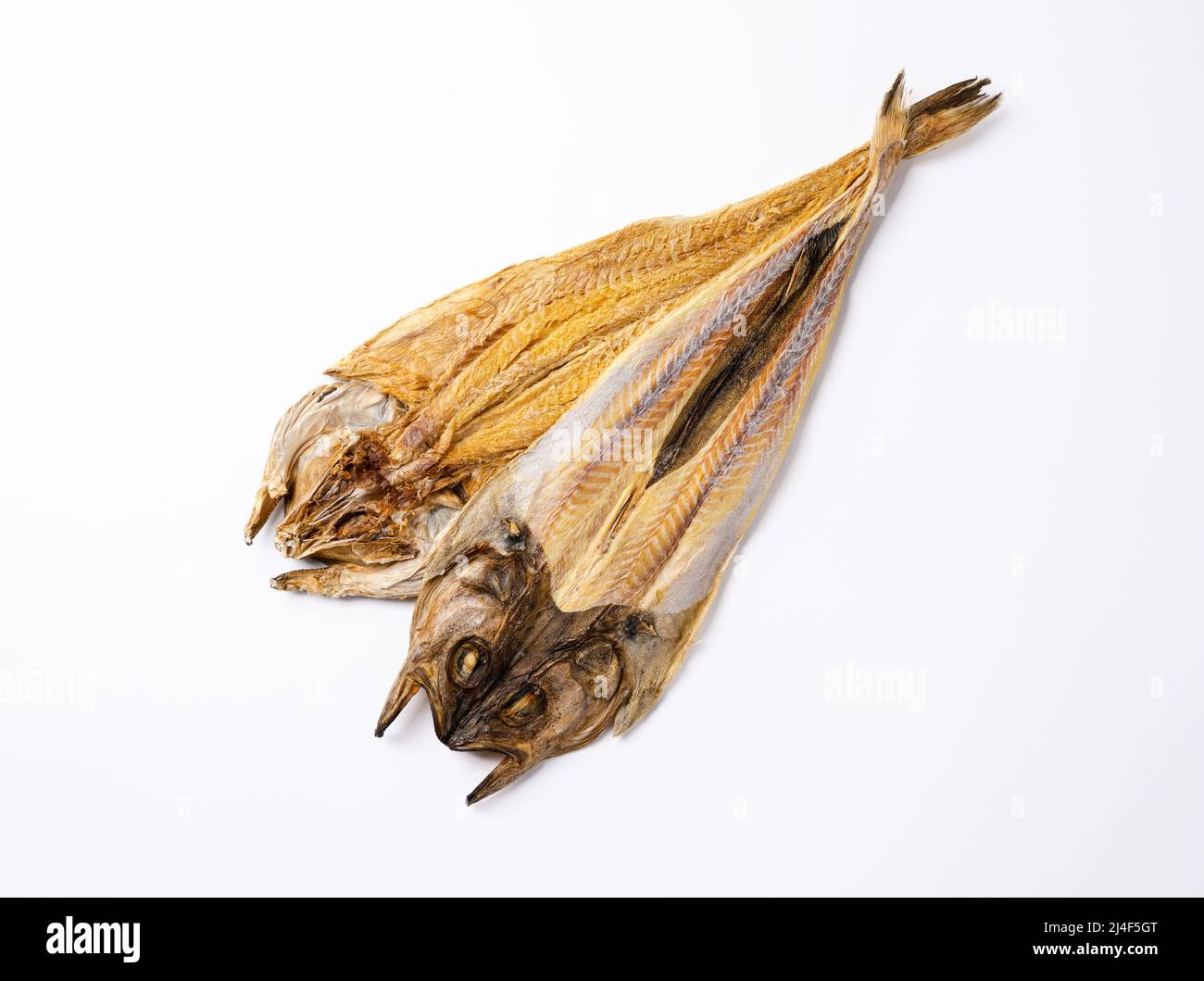 Dried pollack on a white background viewed from above Stock Photo - Alamy