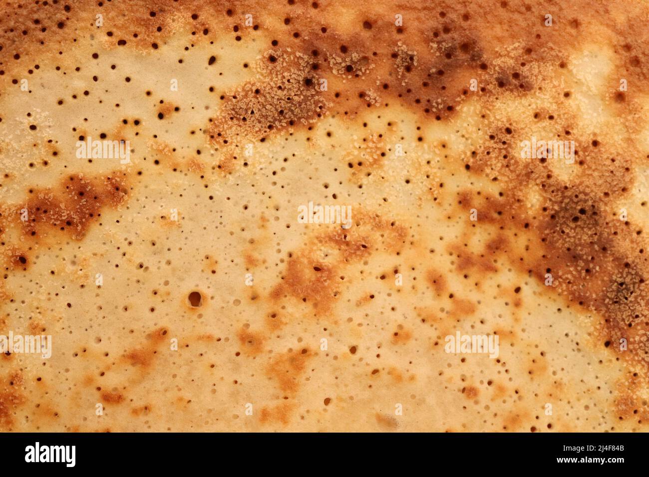 Toasted traditional desert pancake pattern texture. Macro closeup Stock ...