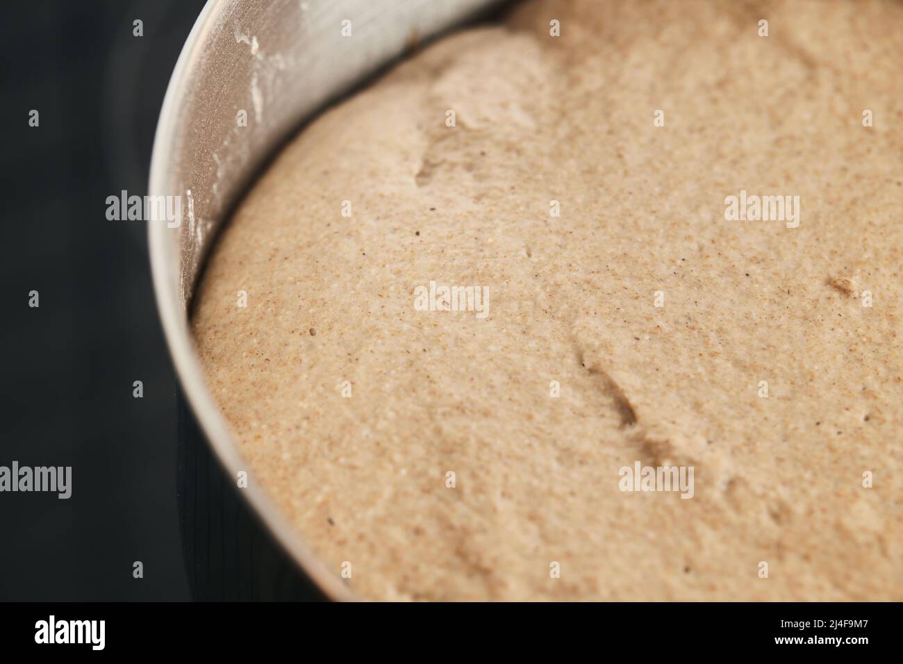 The process of making rye bread. Dough on rye bread before dividing ...