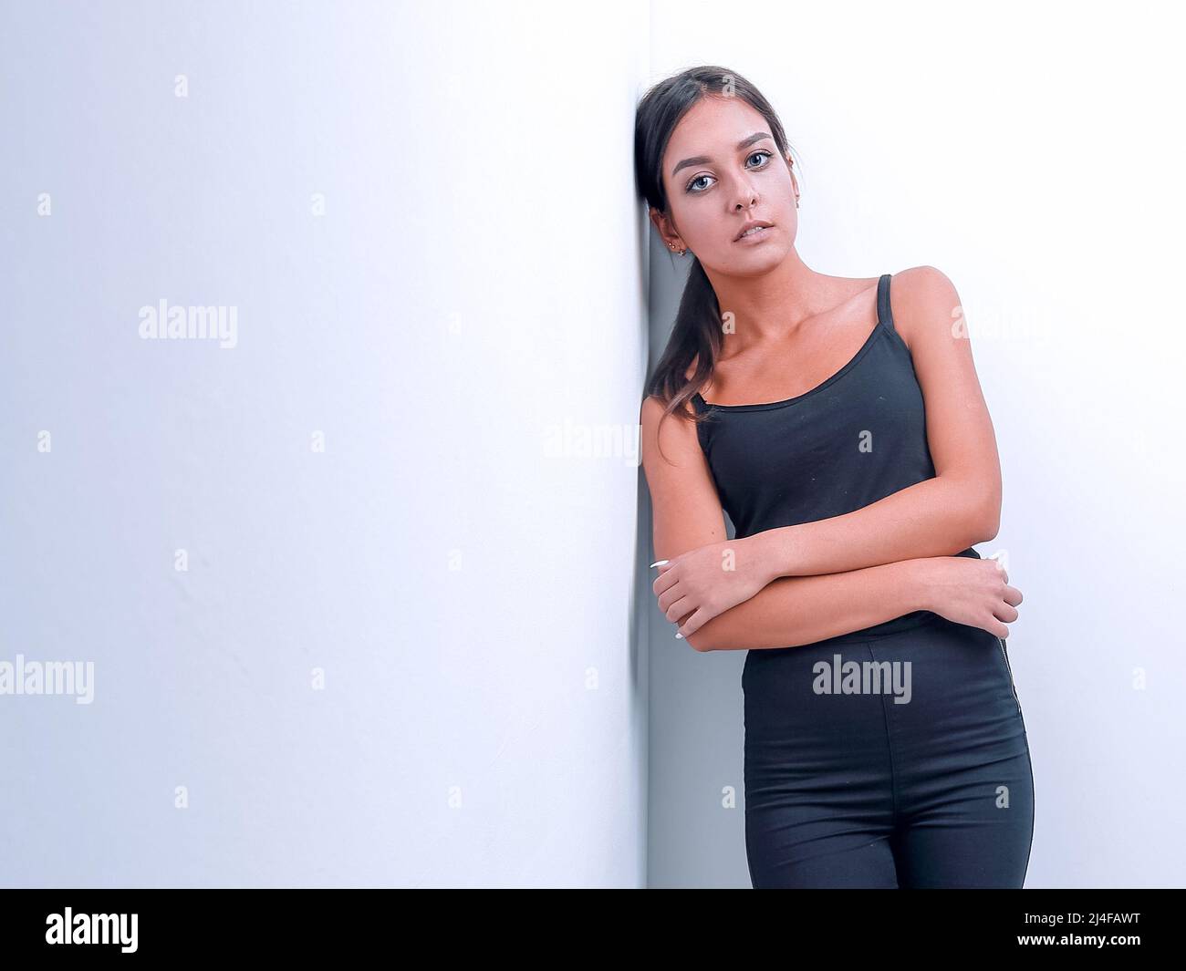 pensive young woman walking forward Stock Photo - Alamy