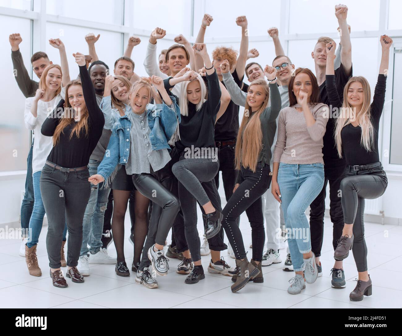 large group of successful young people showing their success Stock ...
