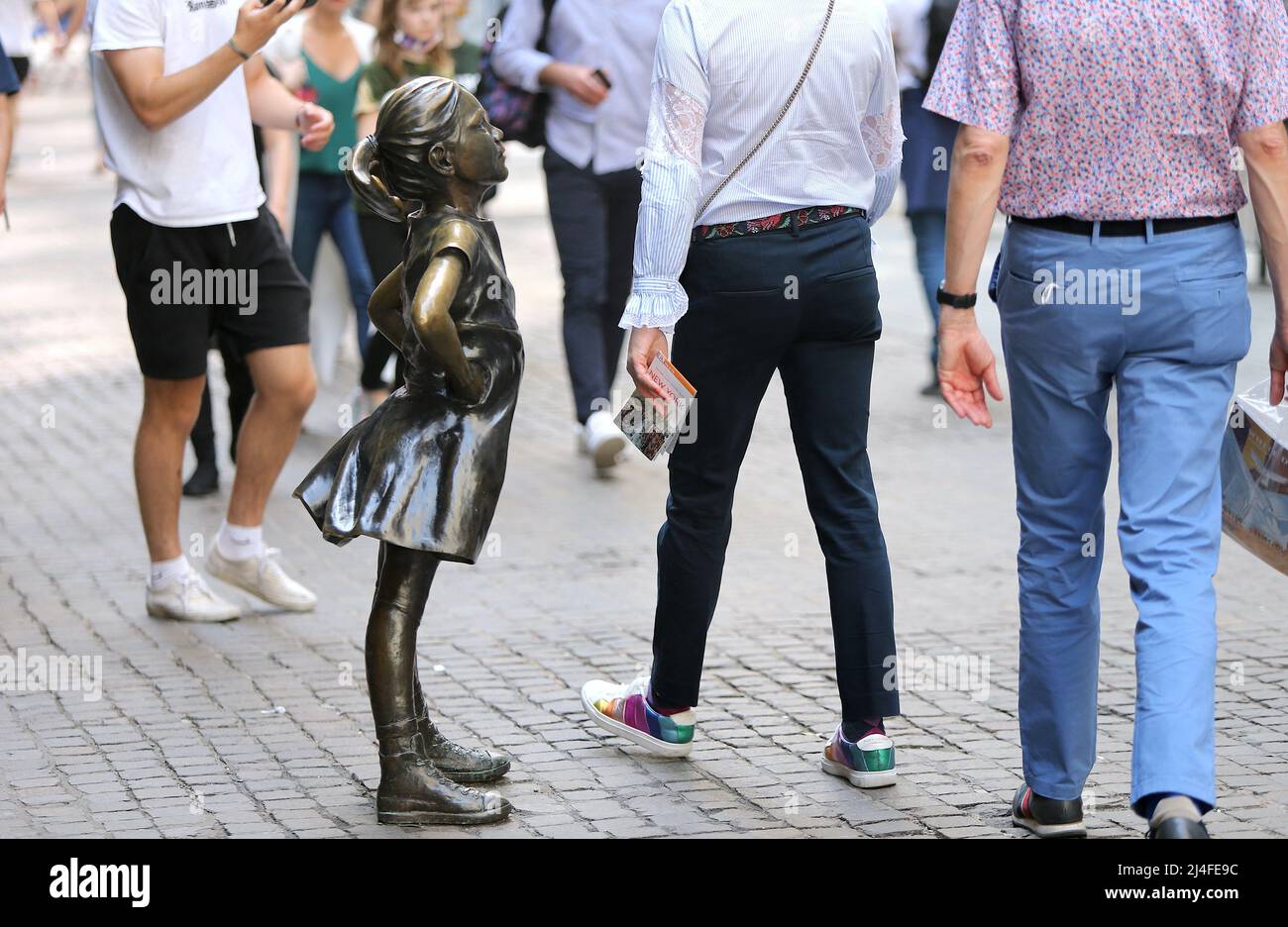 Famous fearless girl statue by Kristen Visbal next to the New York ...