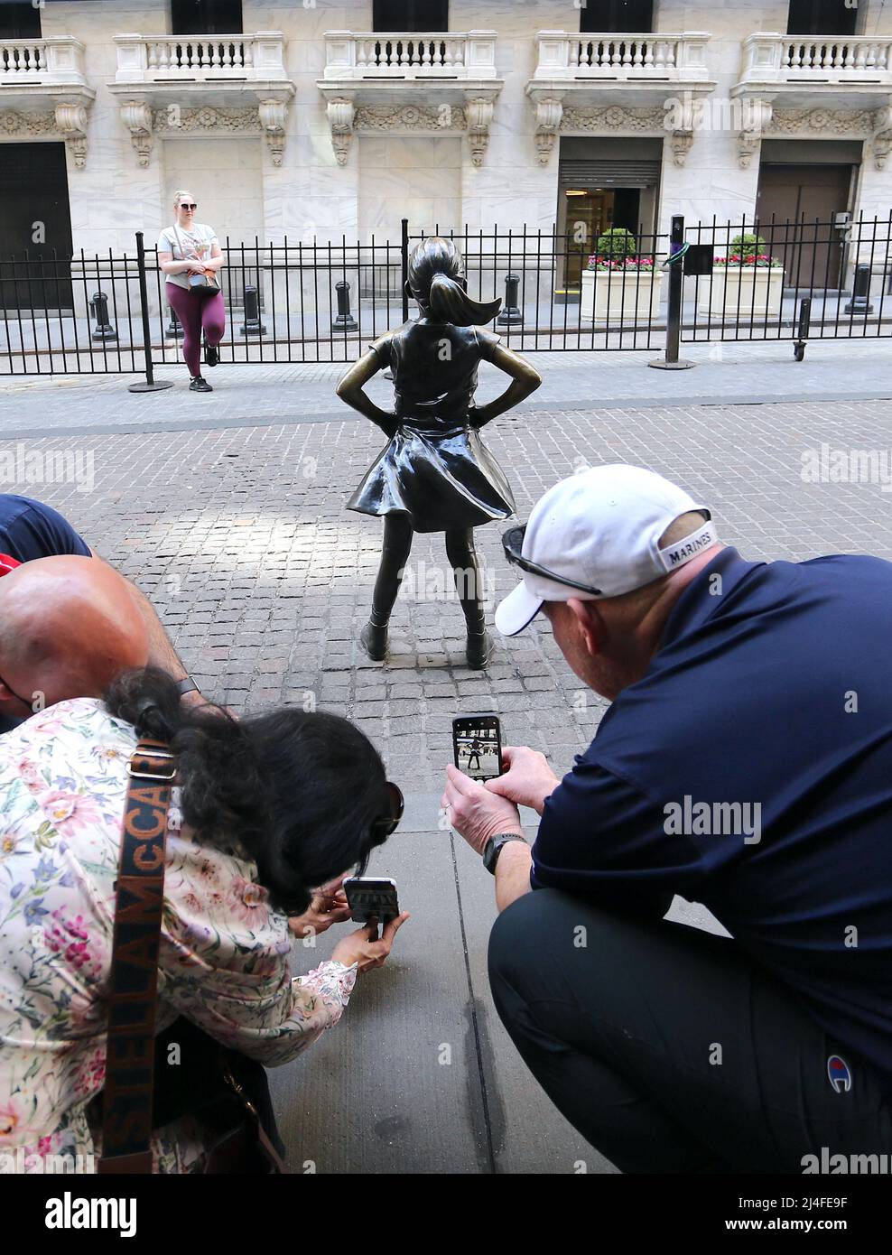 Famous fearless girl statue by Kristen Visbal next to the New York ...
