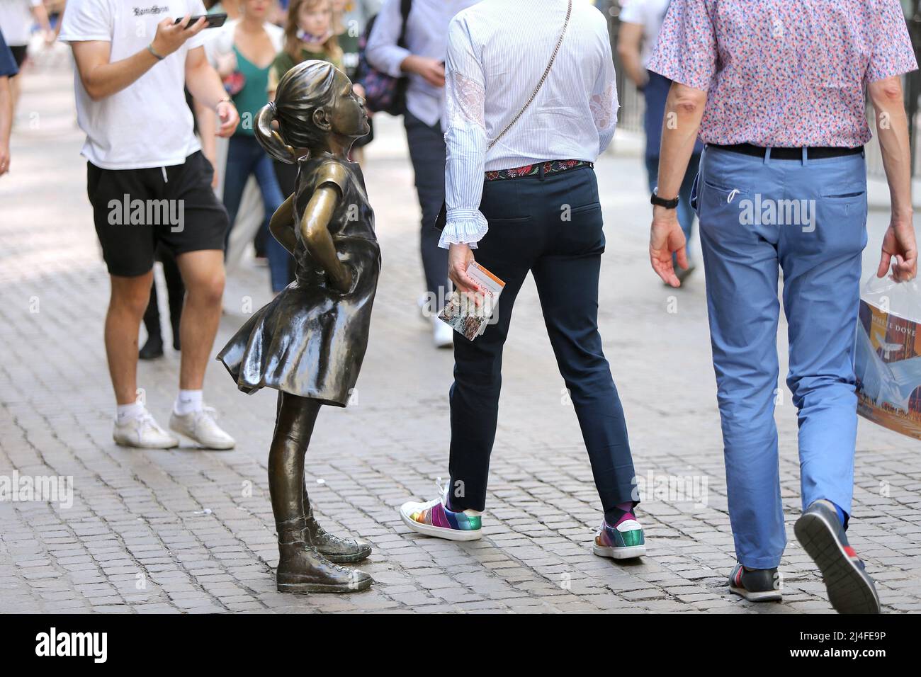 Famous fearless girl statue by Kristen Visbal next to the New York ...