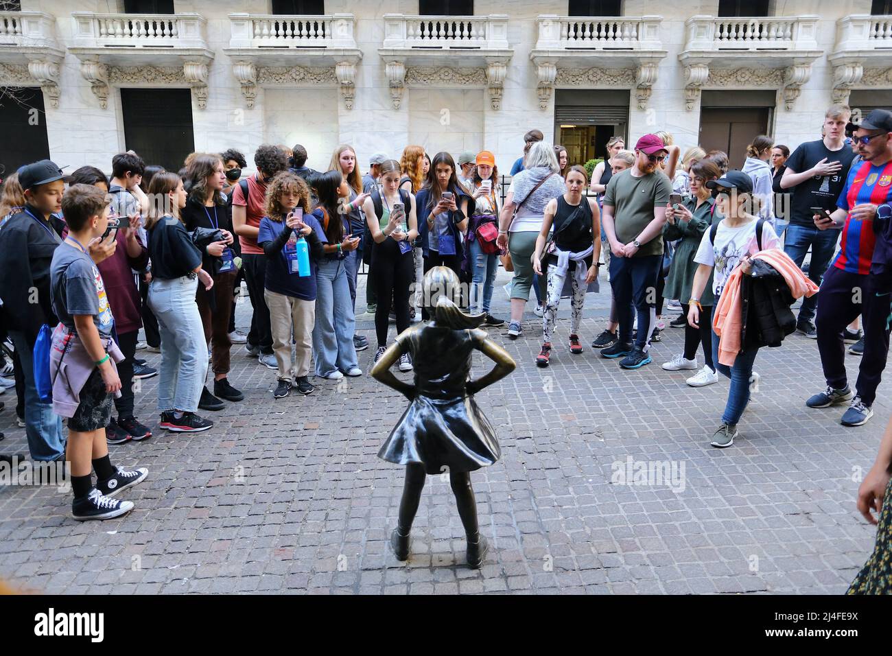 Famous fearless girl statue by Kristen Visbal next to the New York ...