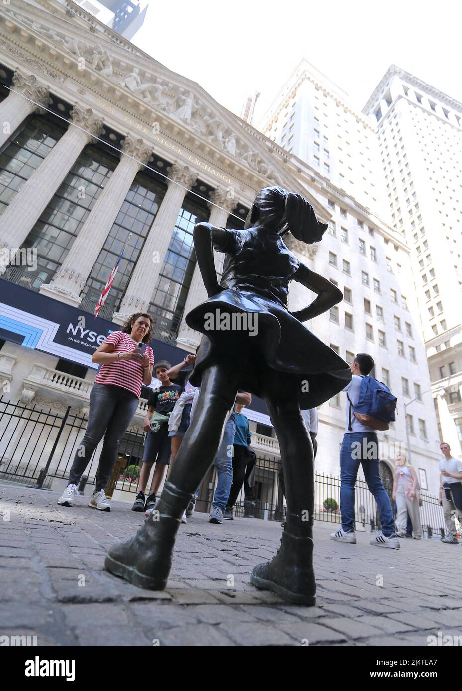 Famous fearless girl statue by Kristen Visbal next to the New York ...
