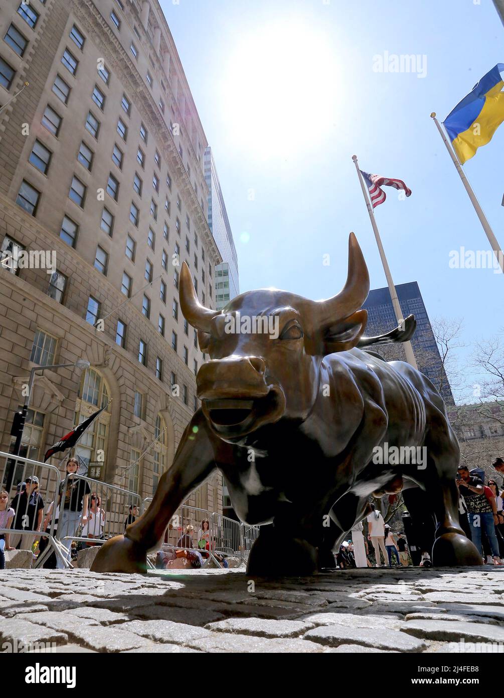Famous Charging Bull by artist Arturo Di Modica on Broadway in New York Downtown, NY on April 14 ...