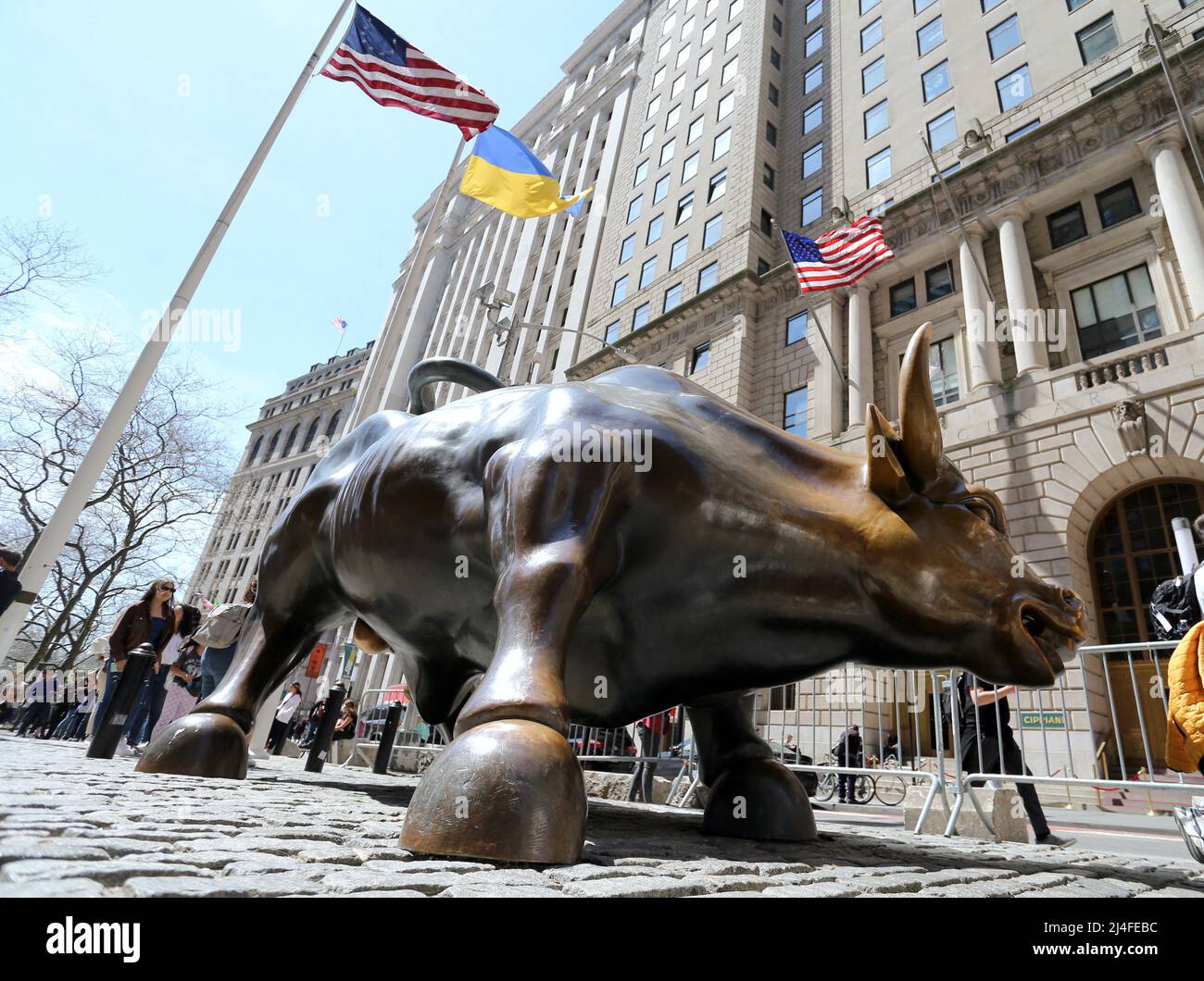 Famous Charging Bull by artist Arturo Di Modica on Broadway in New York Downtown, NY on April 14 ...