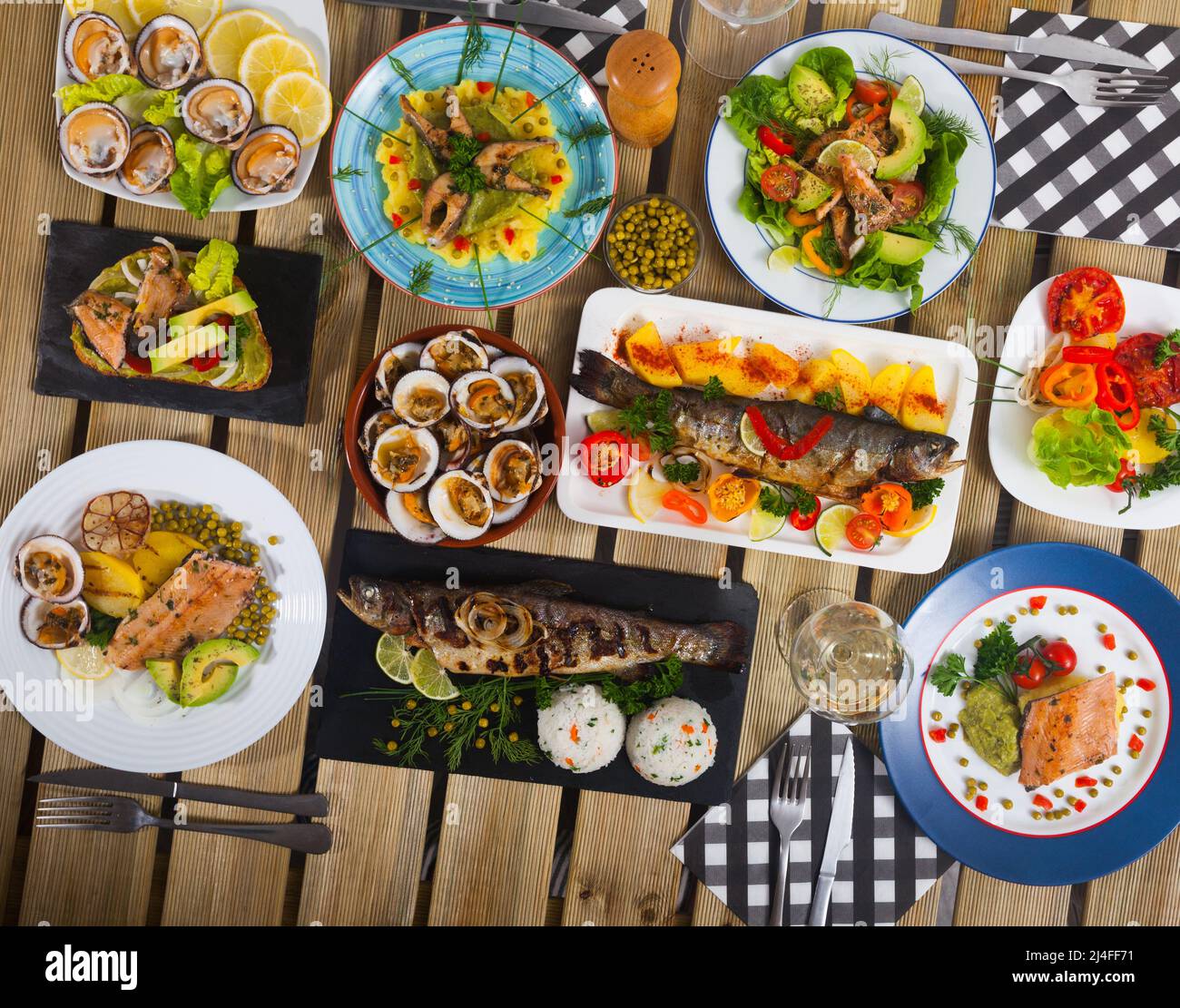 Set of dishes from trout and cockles Stock Photo - Alamy