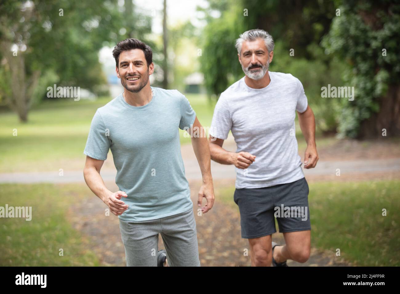 Hispanic men running hi-res stock photography and images - Alamy