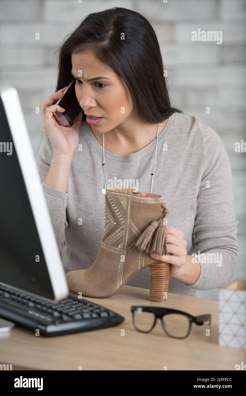 woman receiving wrong parcel with female woman shoes Stock Photo - Alamy