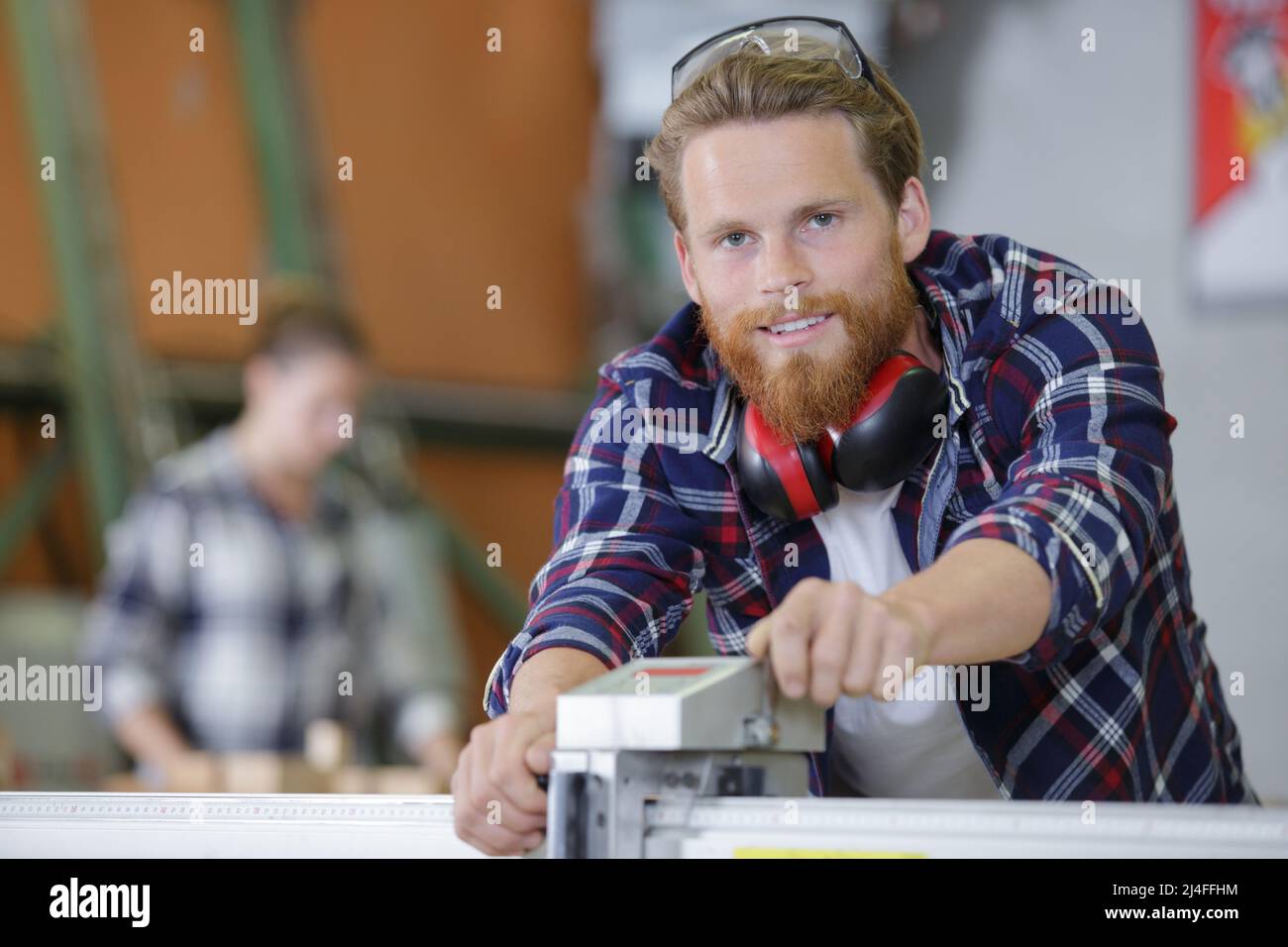 Using a table saw hi-res stock photography and images - Alamy