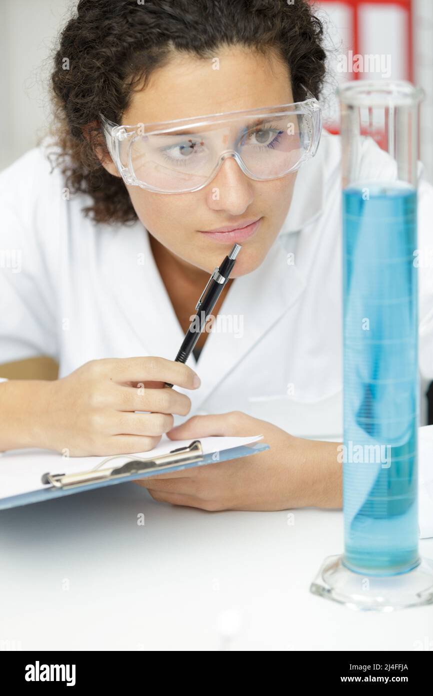 woman scientist take test tube in the laboratory Stock Photo - Alamy