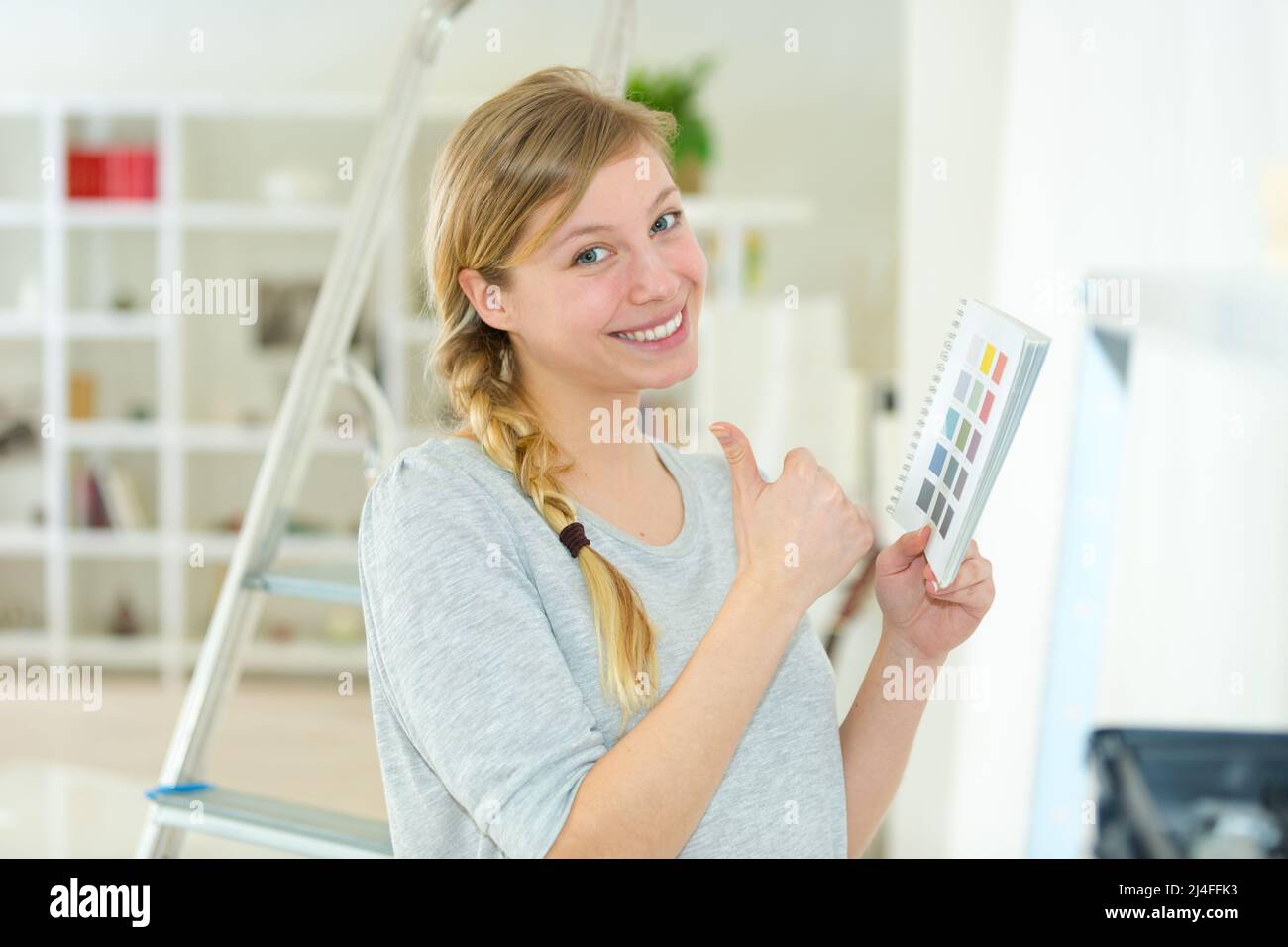 woman choosing color with a colors sampler Stock Photo - Alamy